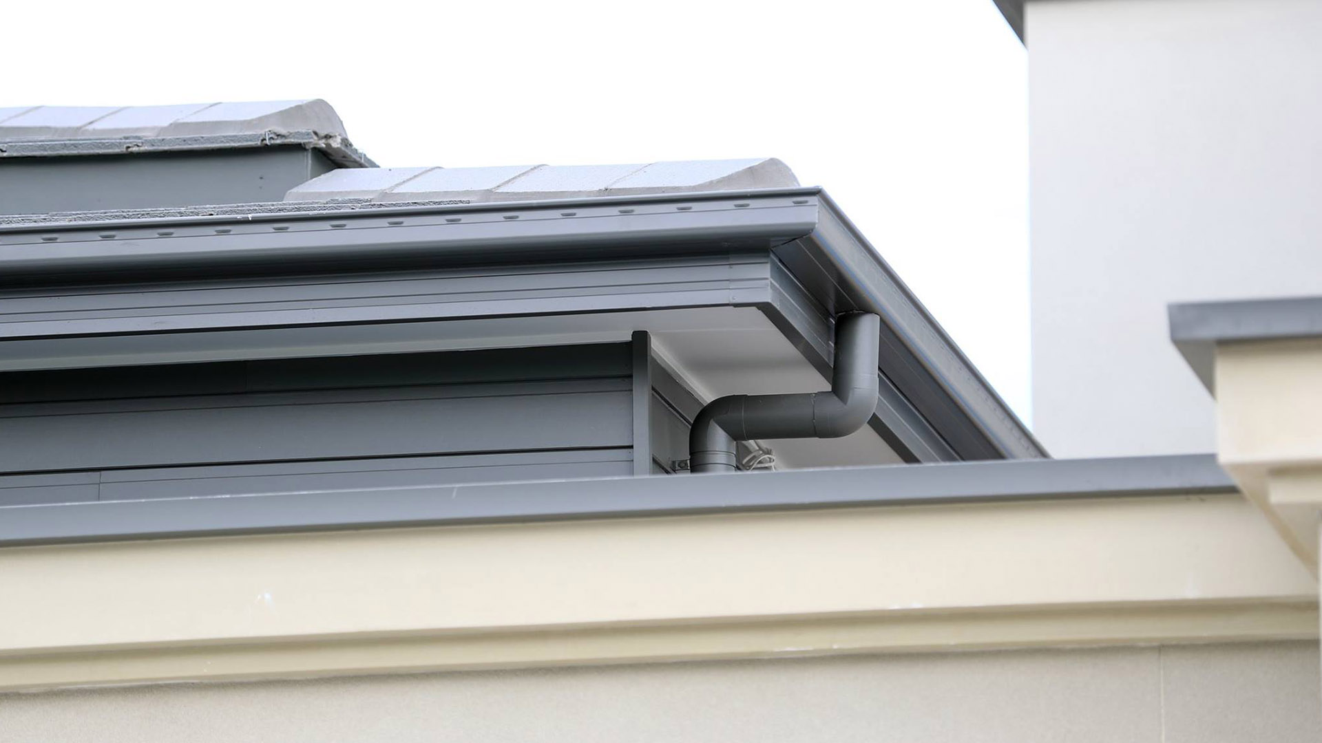 Downpipe Benefits In Reducing Water Damage | Brastin Roofing